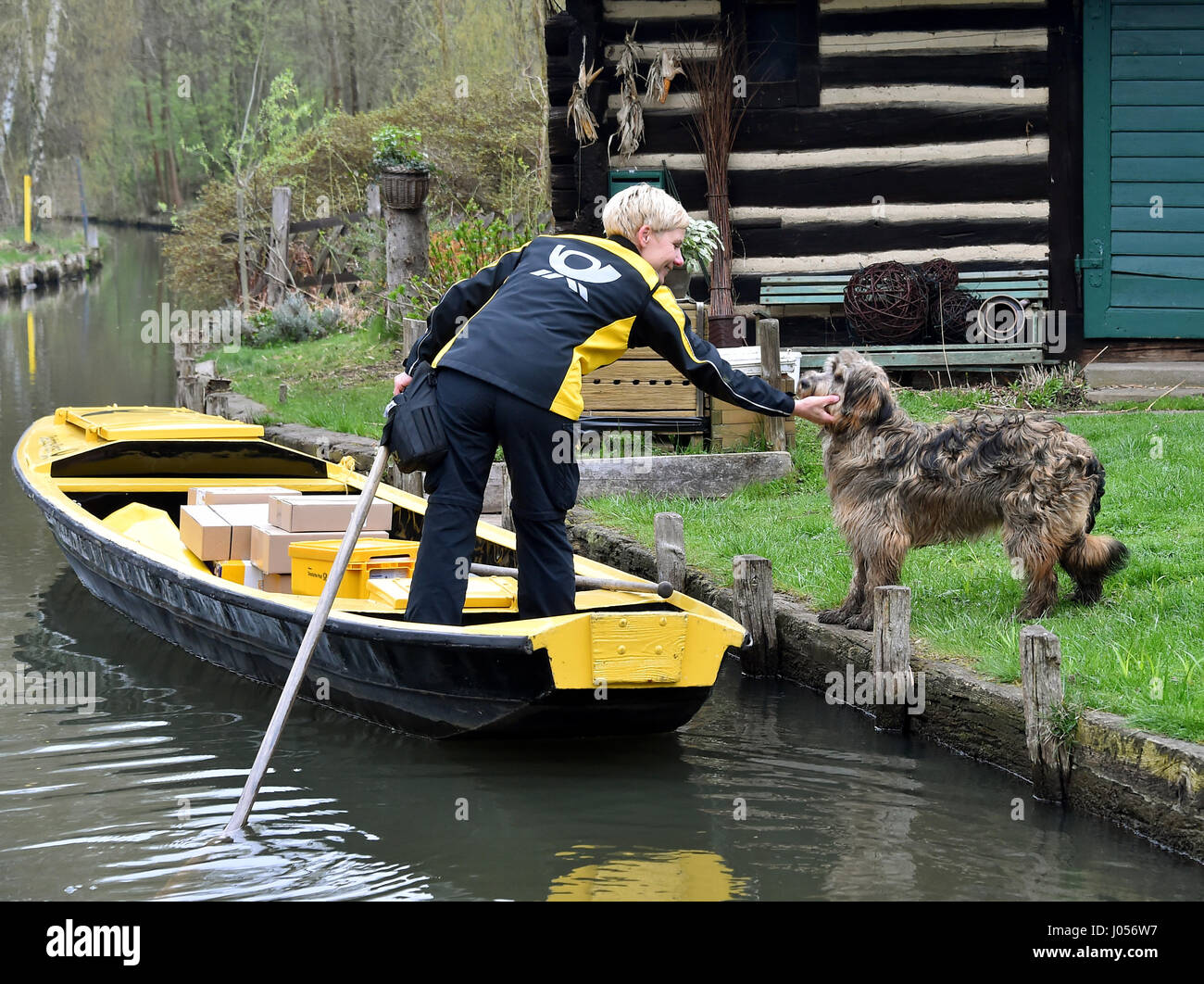 Lehde, Germany. 4th Apr, 2017. Boat delivery person Andrea Bunar stands ...