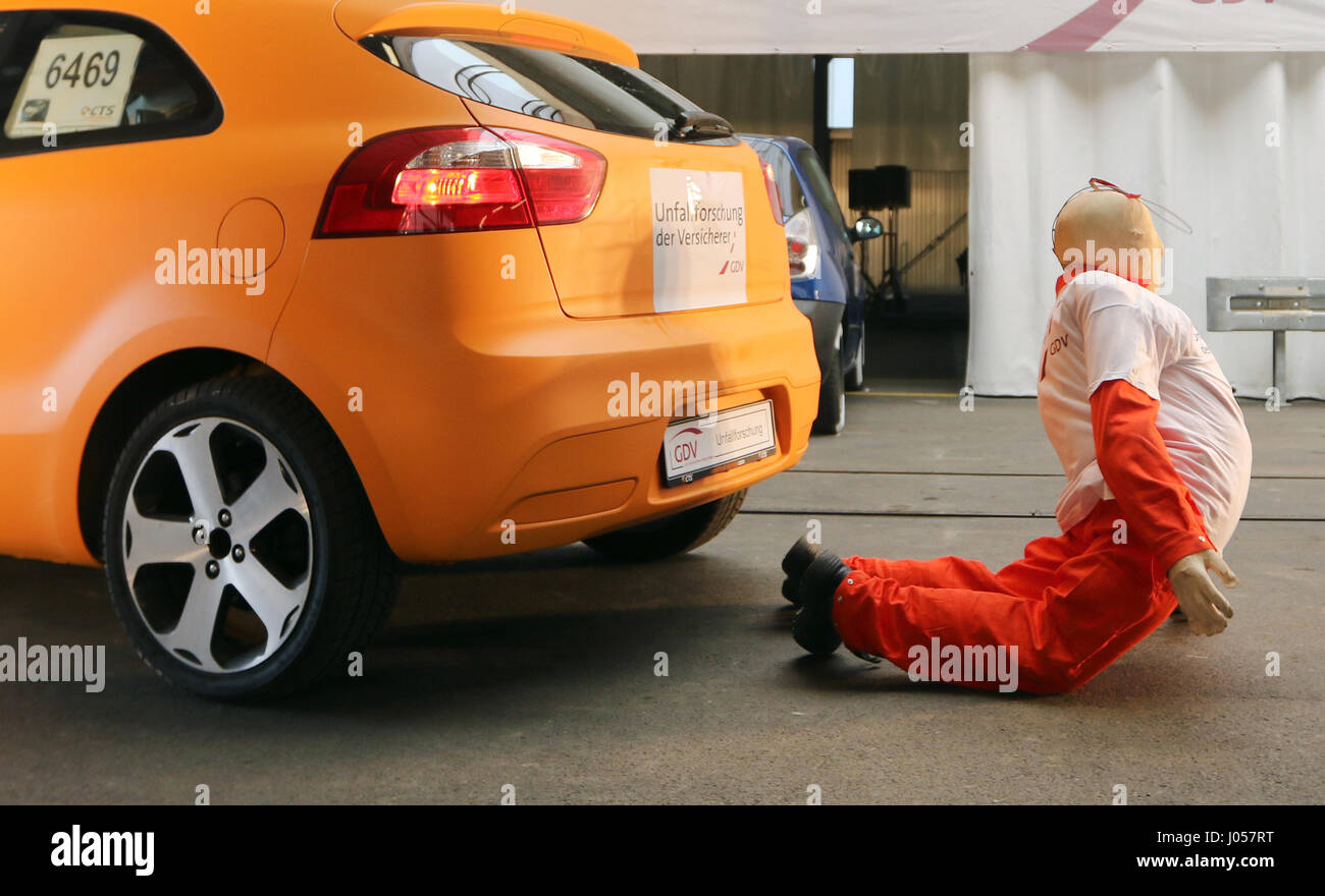 A crash test doll crumbles to the ground during a simulated collision ...
