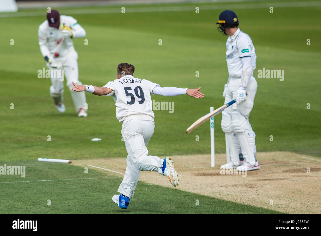 London, UK. 10 April, 2017. Chris Wright loses his middle stump and Tom ...