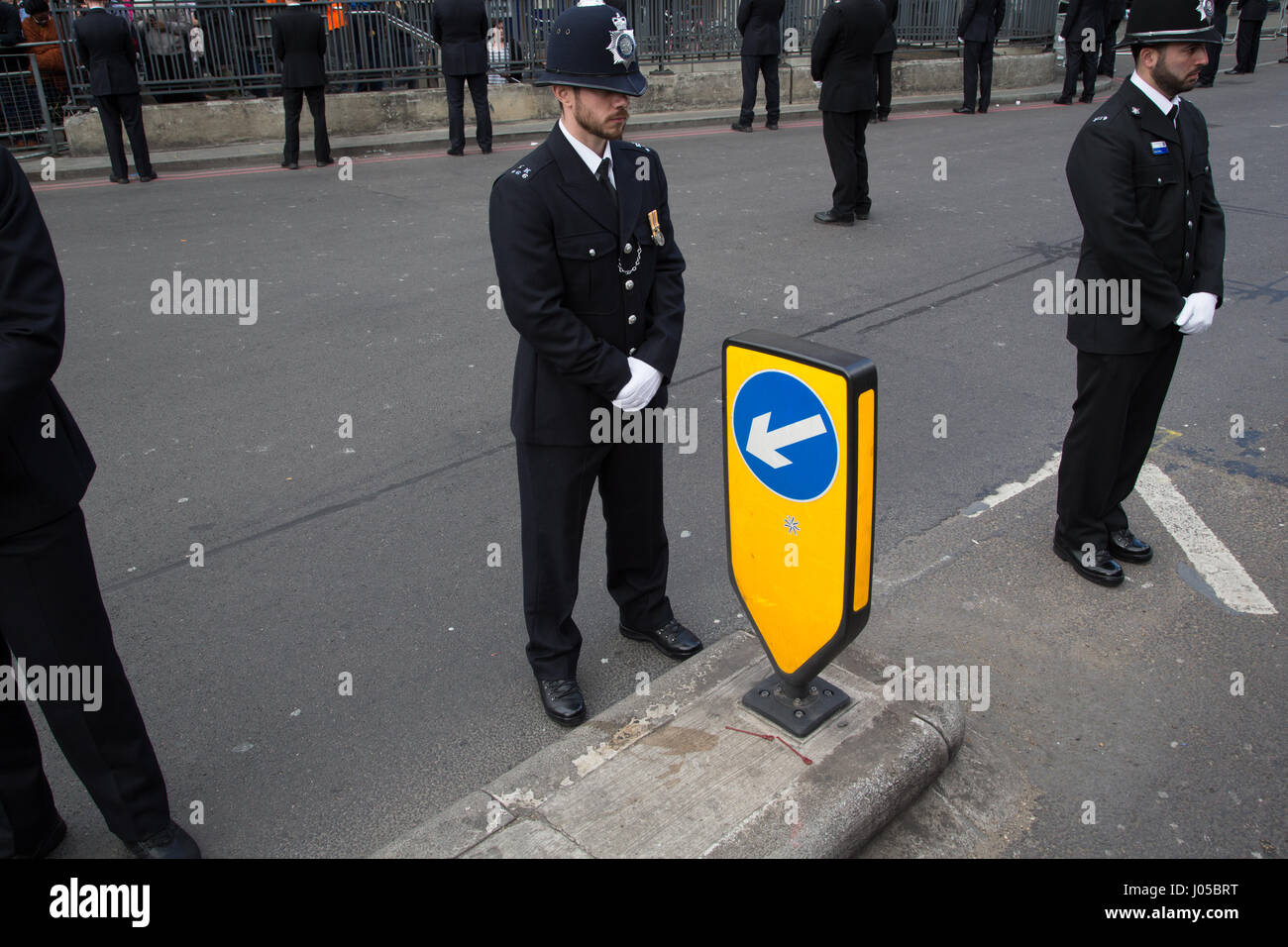 London, UK. 10th Apr, 2017. Police officers line the route in Southwark ...