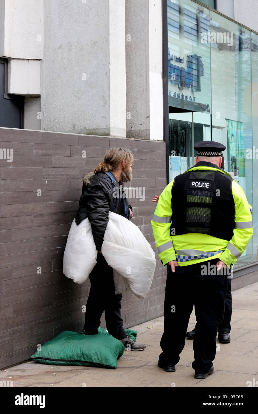 Manchester, UK. 10th Apr, 2017. Police officers speaking to a homeless ...