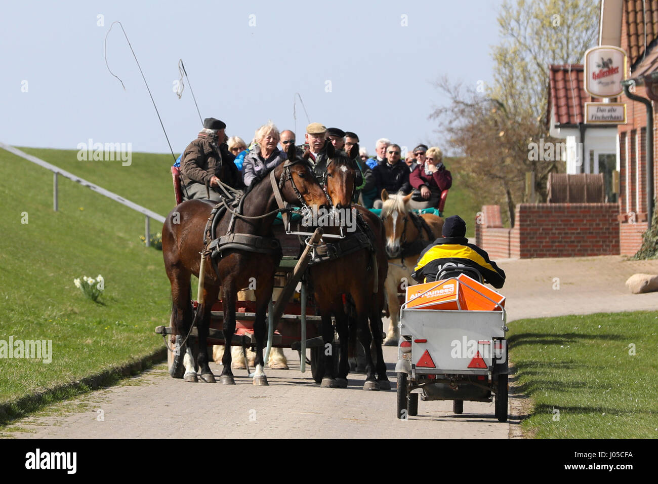 Mailman Michael Stobbe brings the mail with his electric vehicle on ...