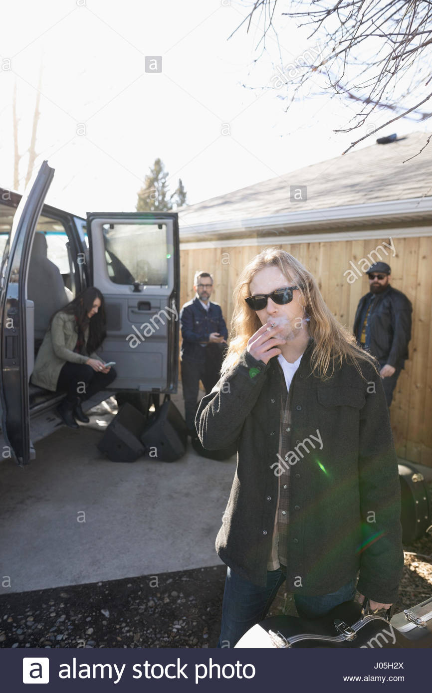 Man in sunglasses smoking cigarette hi-res stock photography and images ...