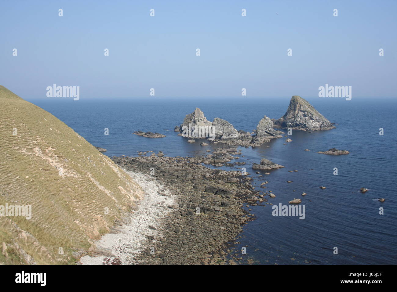 Sea stacks of Clach Bheag Na Faraid and Clach Mhor Na Faraid near ...
