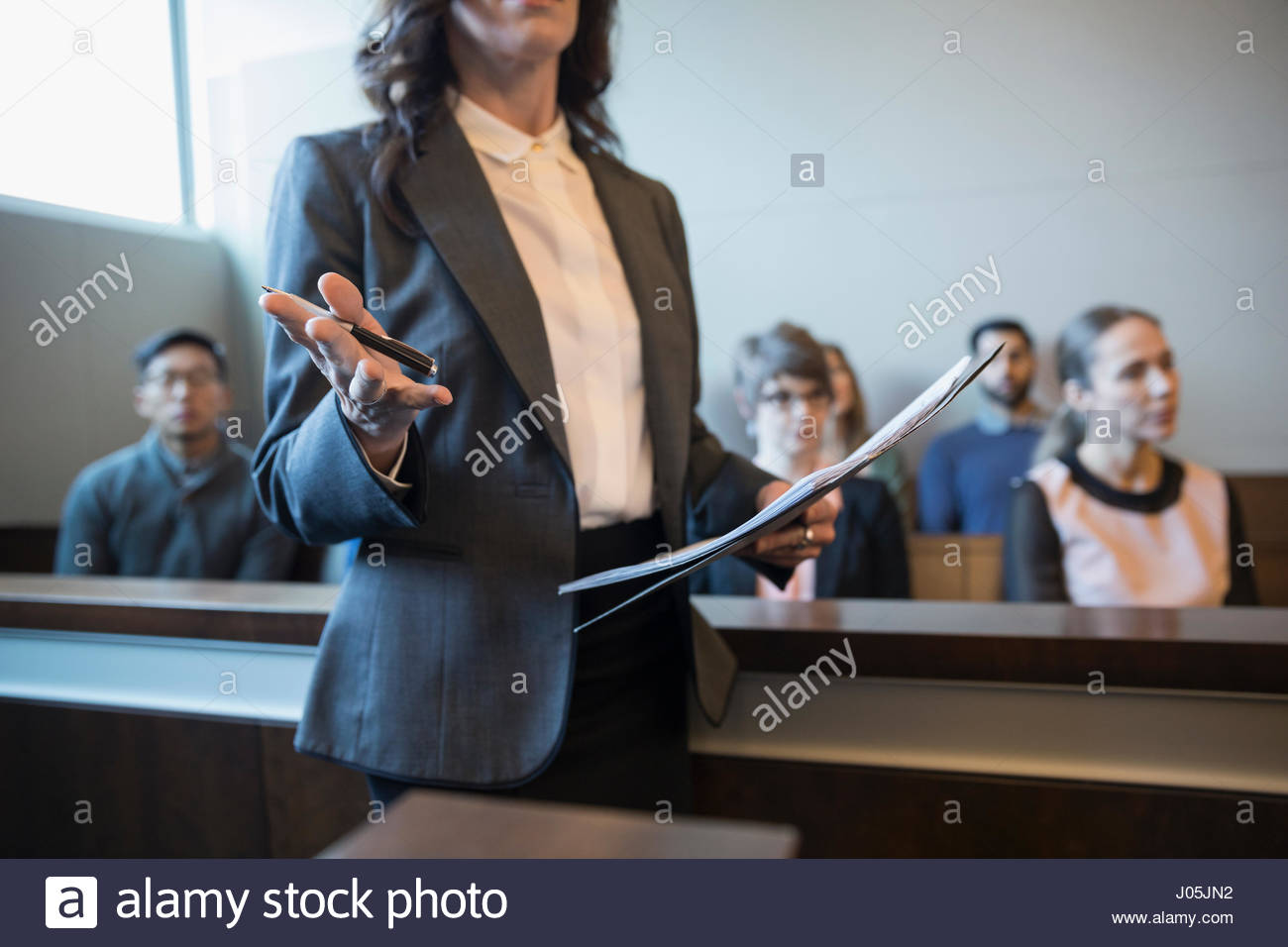 Female lawyer standing in courtroom hi-res stock photography and images ...