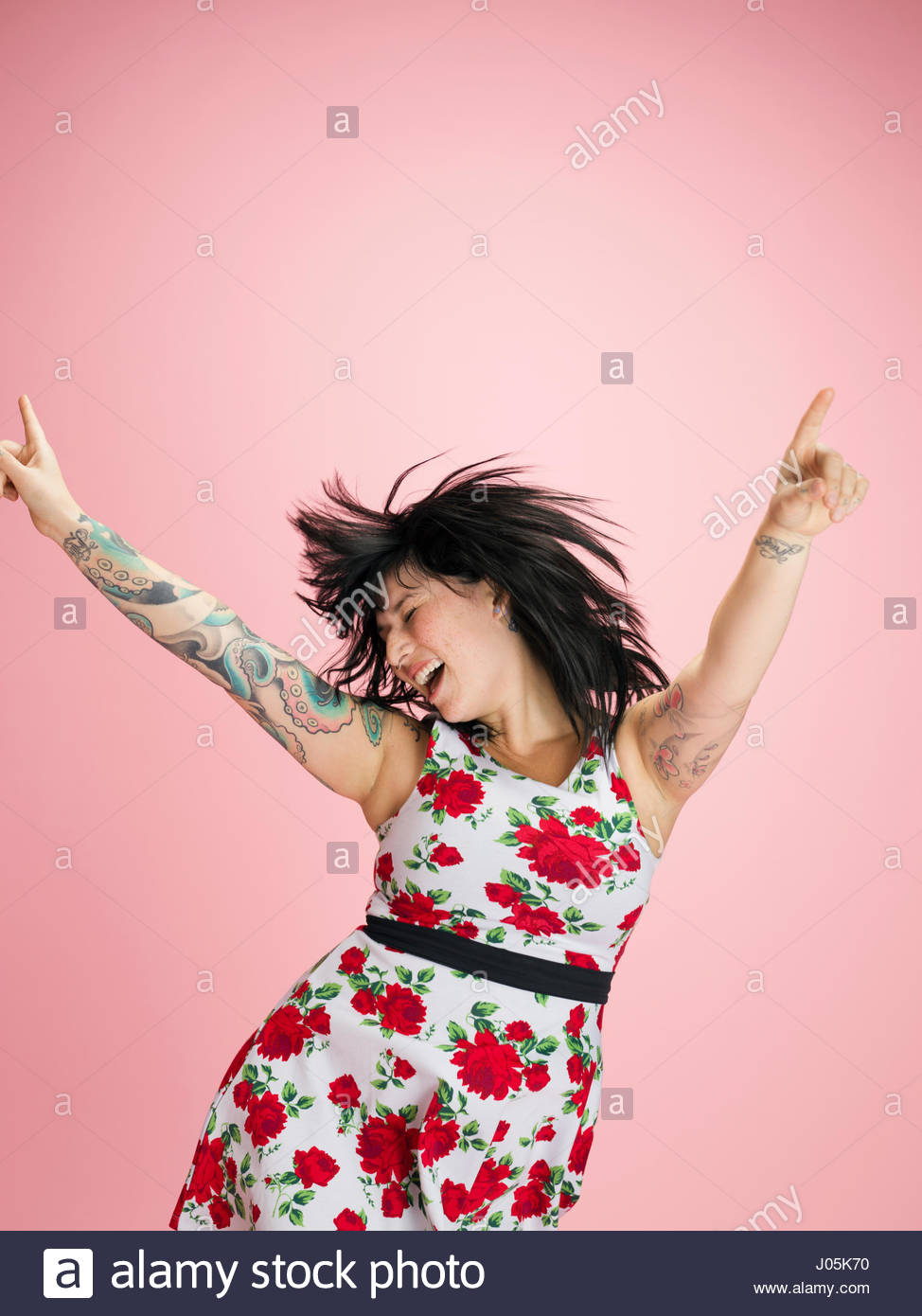 Woman tattooed arms hi-res stock photography and images - Alamy