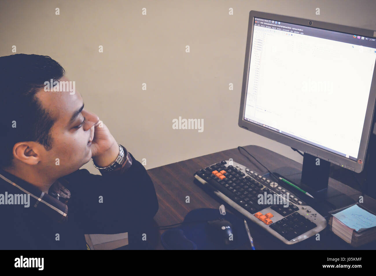 young business man working on computer and thinking about work Stock ...