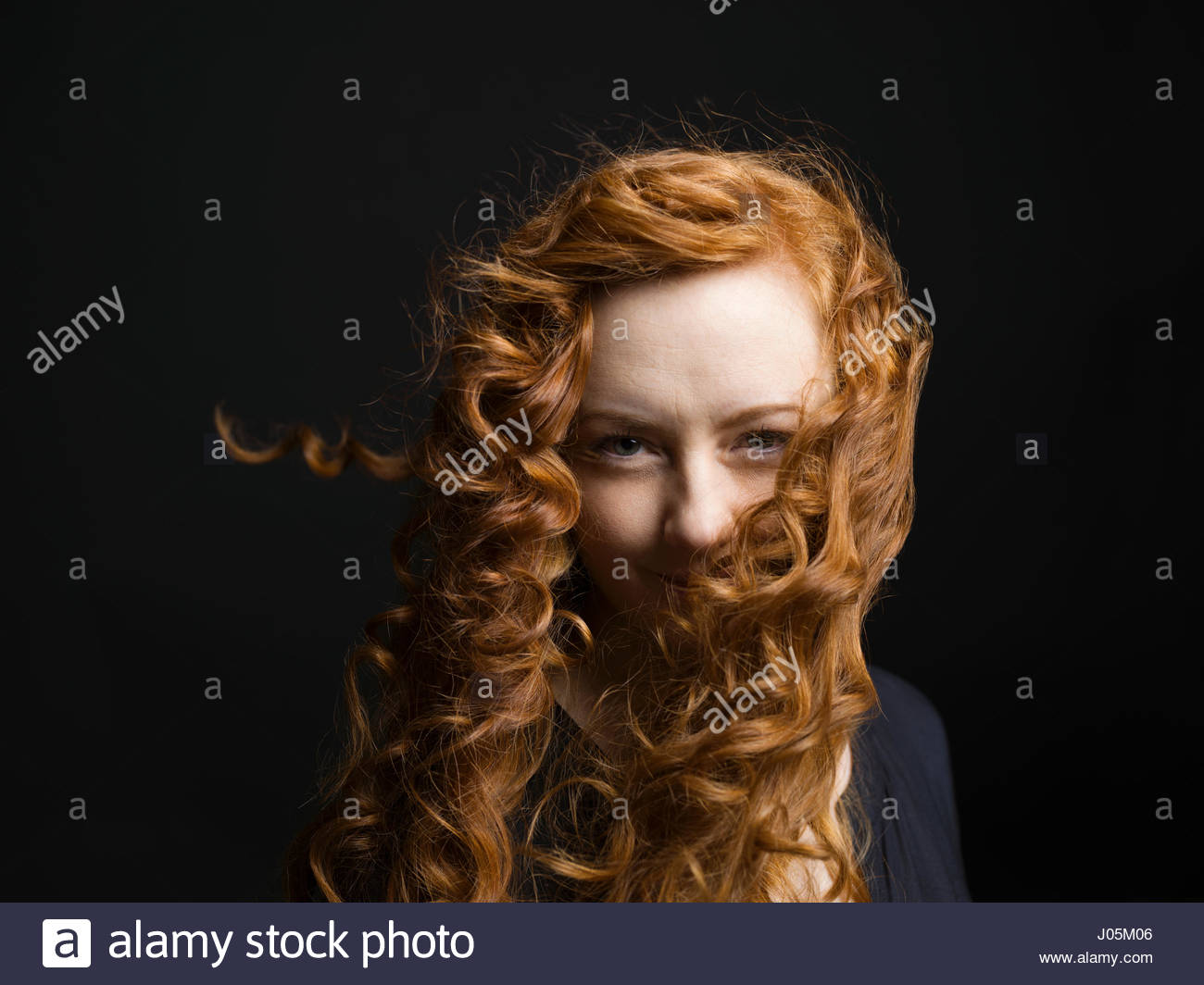 Portrait wind blowing long curly hi-res stock photography and images ...
