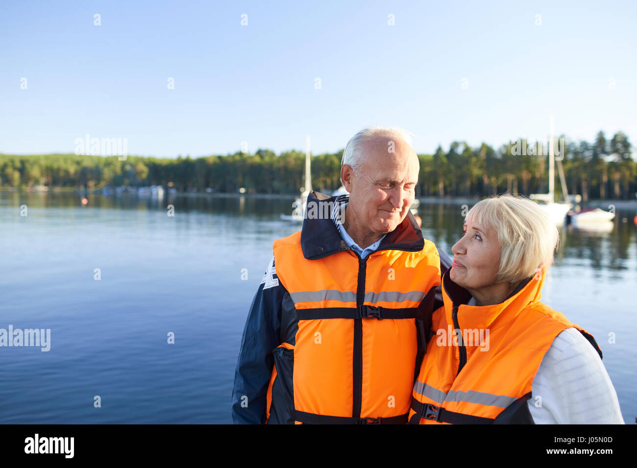Wearing life vests hi-res stock photography and images - Alamy