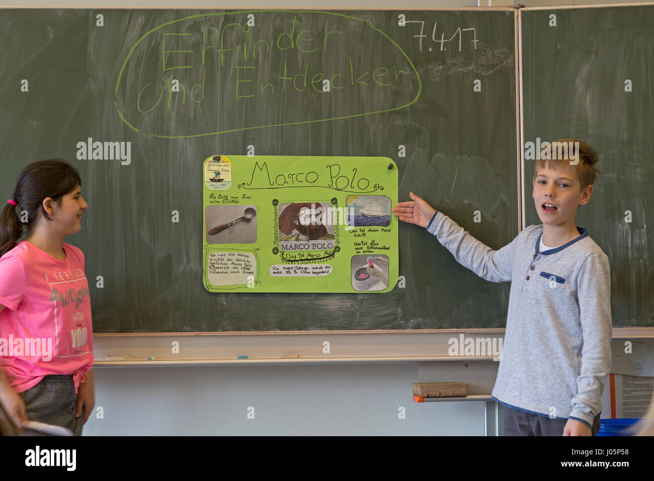 pupils at primary school doing a presentation, Lower Saxony, Germany ...