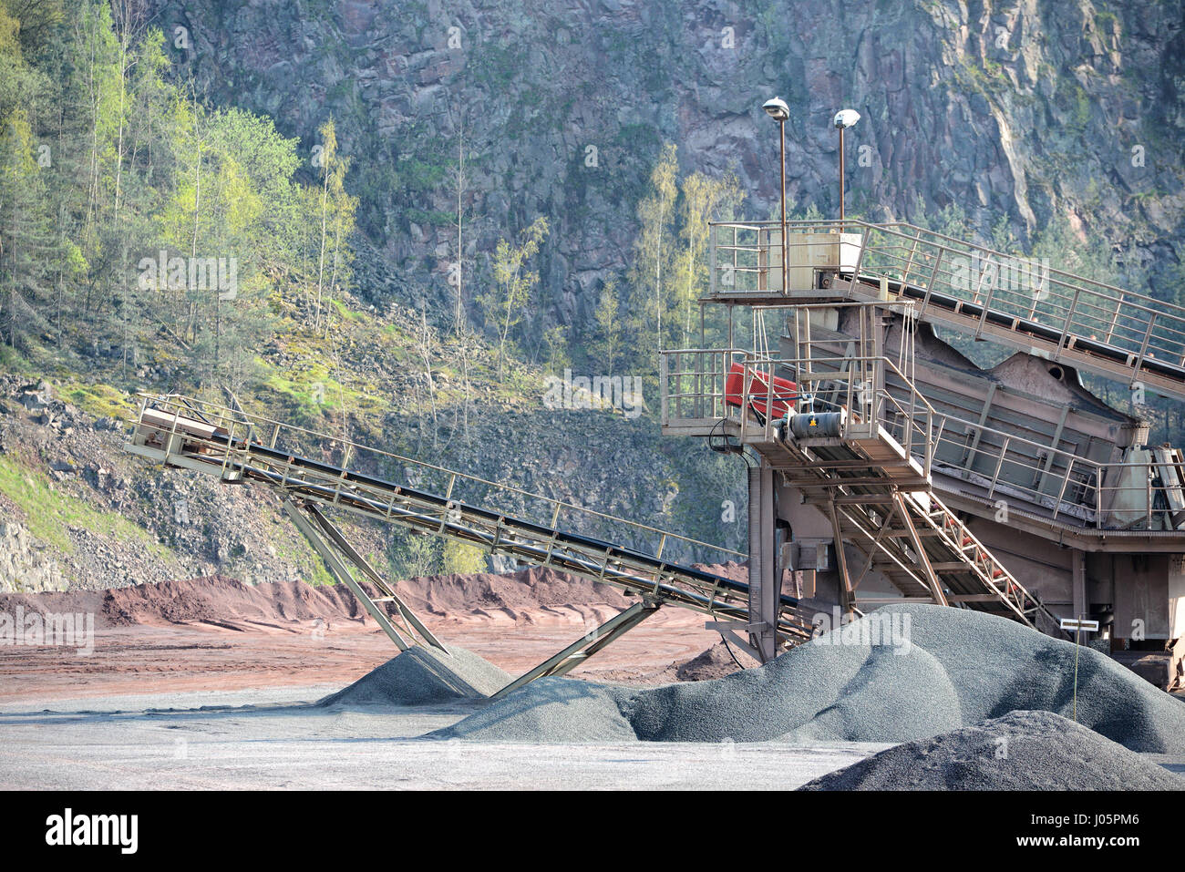 stone crusher in a quarry. mining industry Stock Photo - Alamy