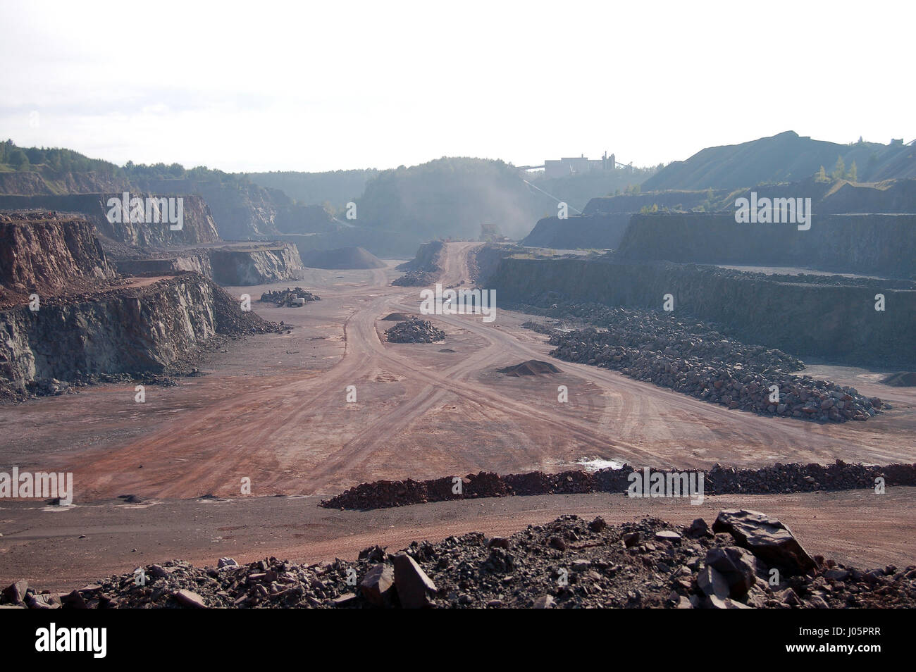 aerial view over a quarry hole. mining industry Stock Photo - Alamy