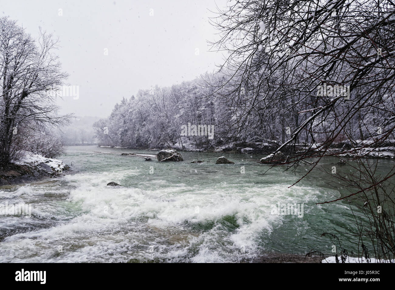 Isar river in wintertime with snow, next to Pullach (Bavaria, Germany ...