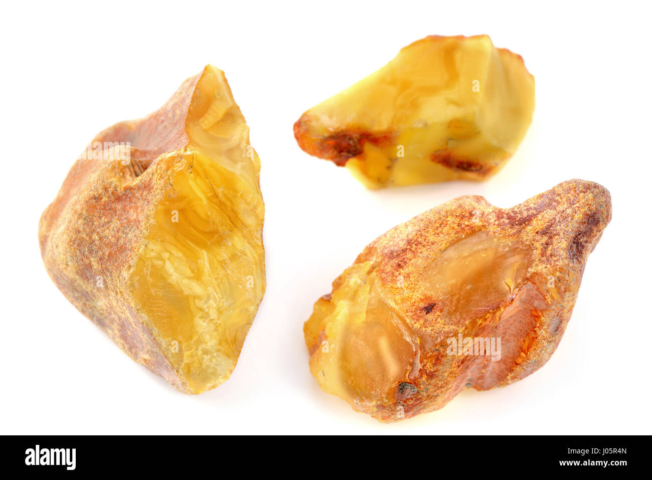 Amber stone on white isolated background Stock Photo - Alamy