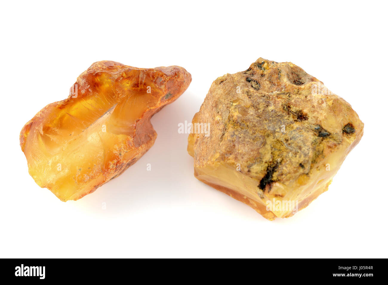 Amber stone on white isolated background Stock Photo - Alamy