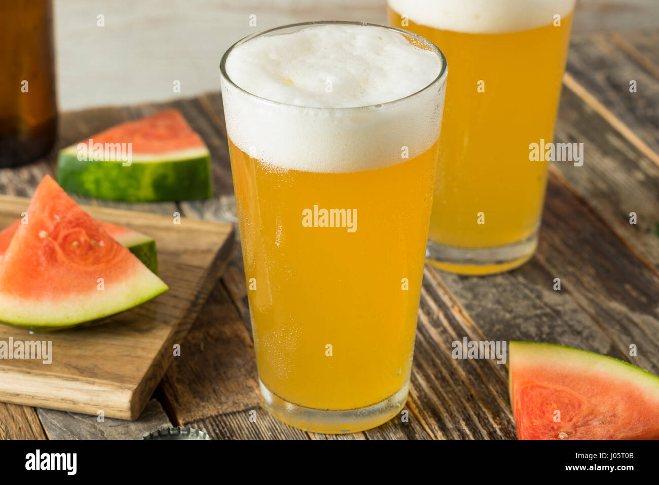 Sweet Alcoholic Watermelon Beer in a Pint Glass Stock Photo - Alamy
