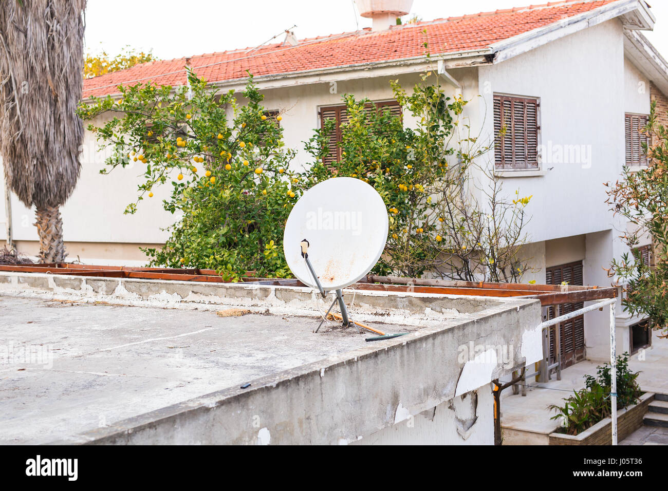 Satellite dish on the roof Stock Photo - Alamy
