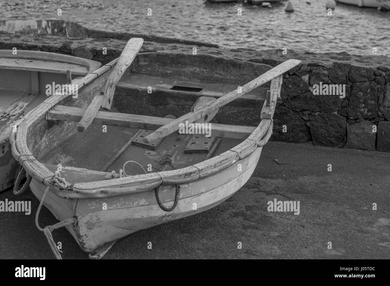 Old harbor boats sunset Black and White Stock Photos & Images - Alamy