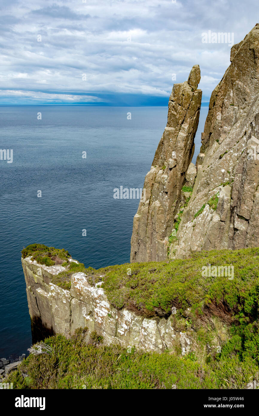 Rock column and cliffs at Benmore, or Fair Head, County Antrim ...