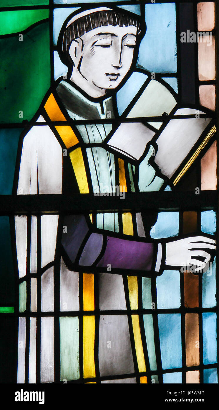 Stained Glass in the Church of Tervuren, Belgium, depicting a priest ...