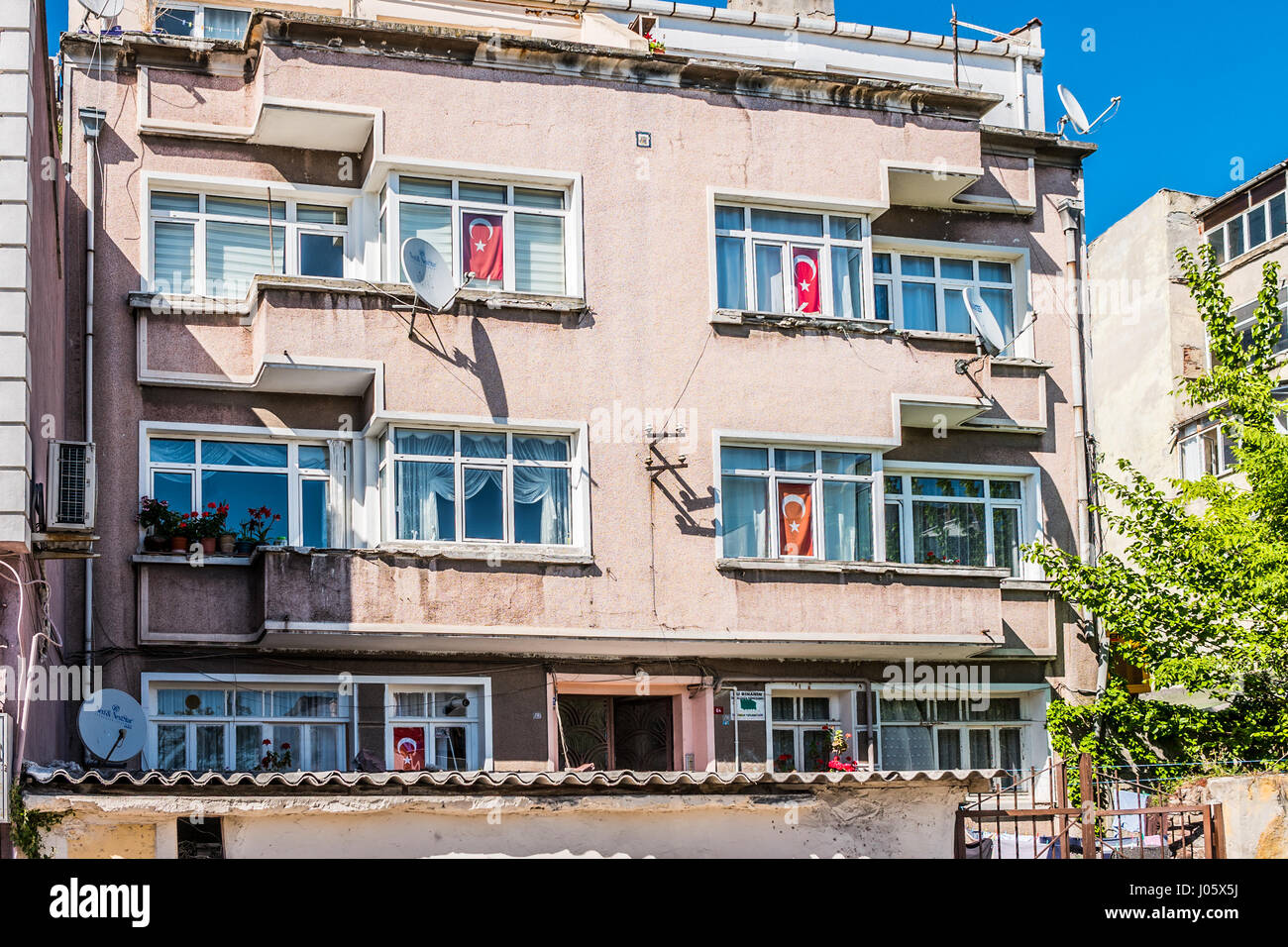 Turkish flags displayed in apartment windows in Istanbul, Turkey Stock ...