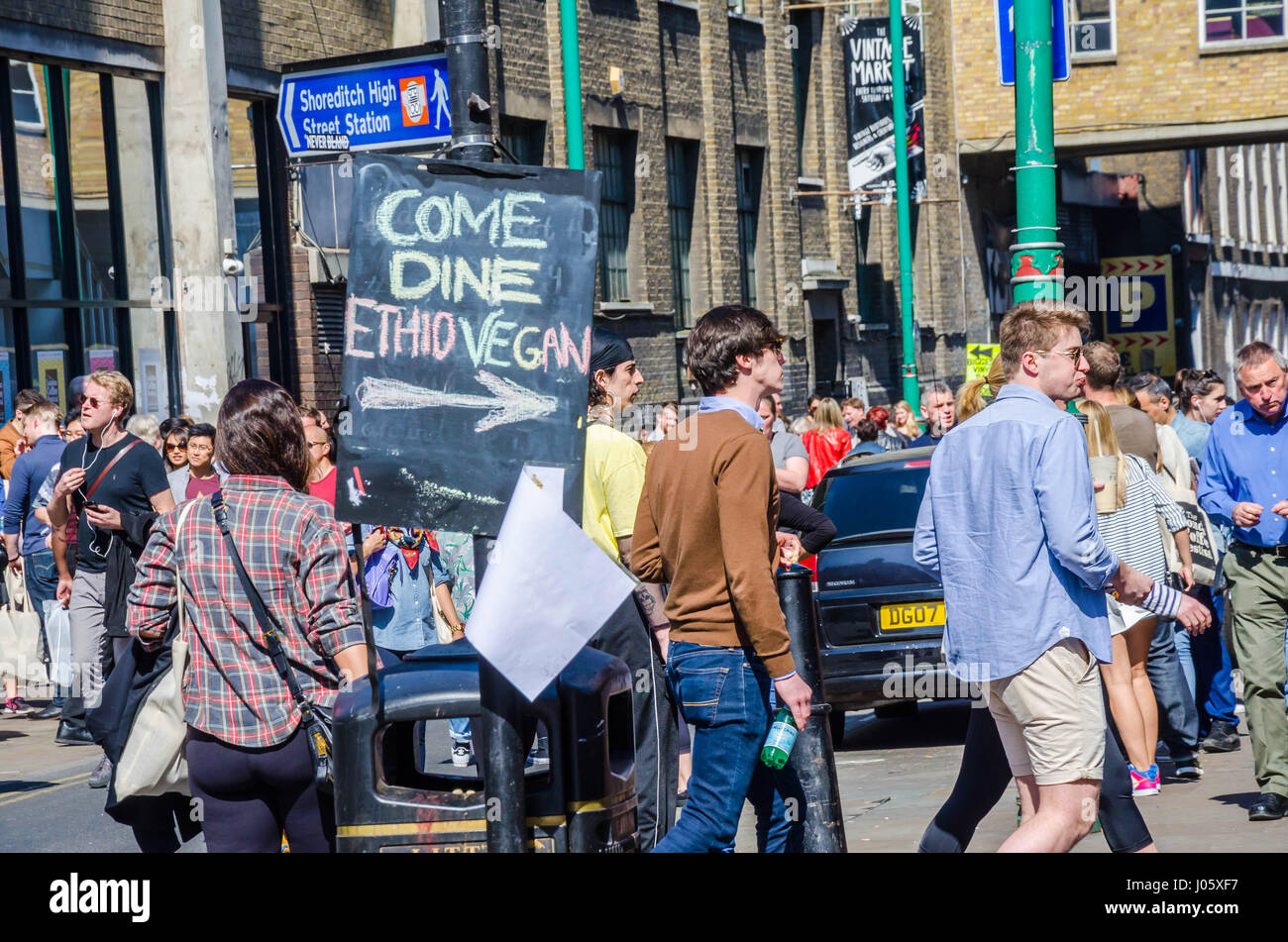 A view of a busy scene on Brick Lane Stock Photo - Alamy