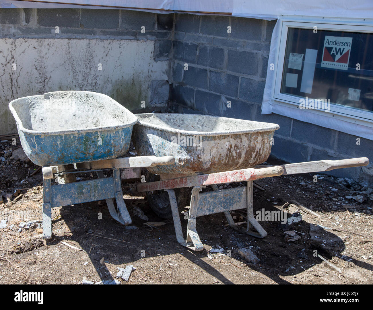 Wheelbarrows at a construction site Stock Photo - Alamy