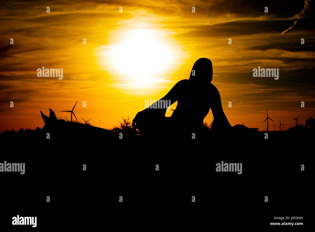 Silhouette in sunset Stock Photo - Alamy