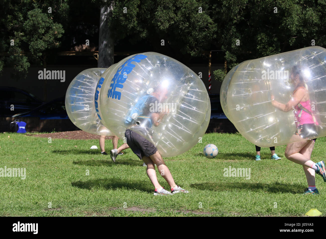 People play ‘bubble soccer’ or ‘bubble football’ at Wentworth Park ...
