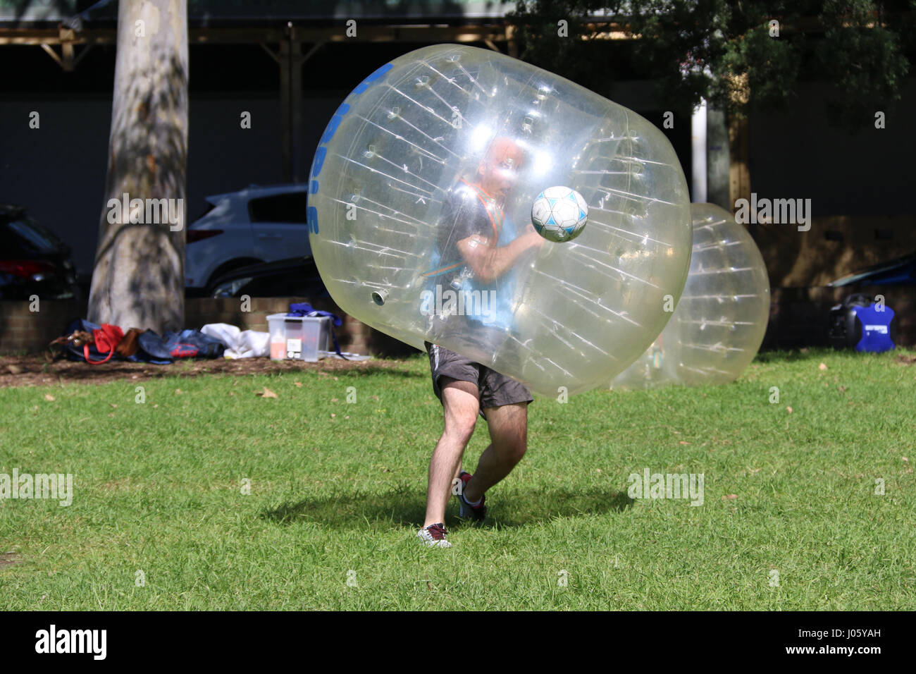 People play ‘bubble soccer’ or ‘bubble football’ at Wentworth Park ...
