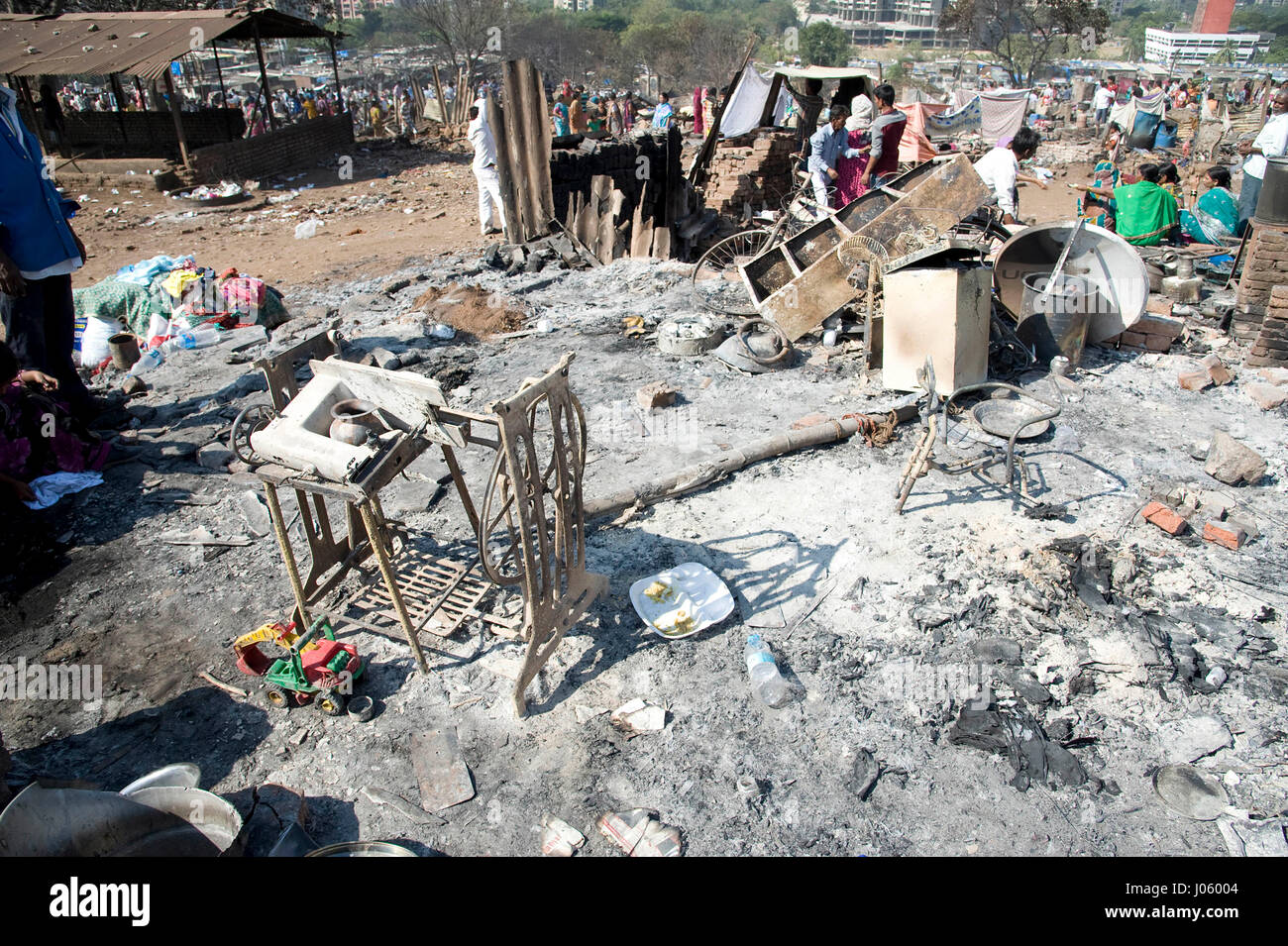 Damaged sewing machine after slum fire, damu nagar, kandivali, mumbai ...