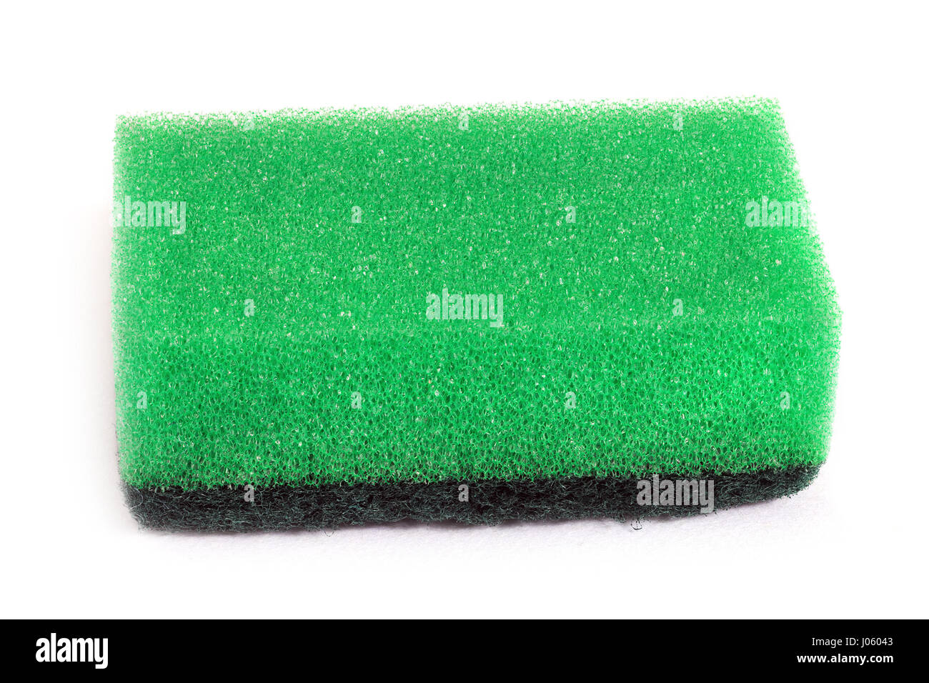 Green sponge on white background Stock Photo - Alamy