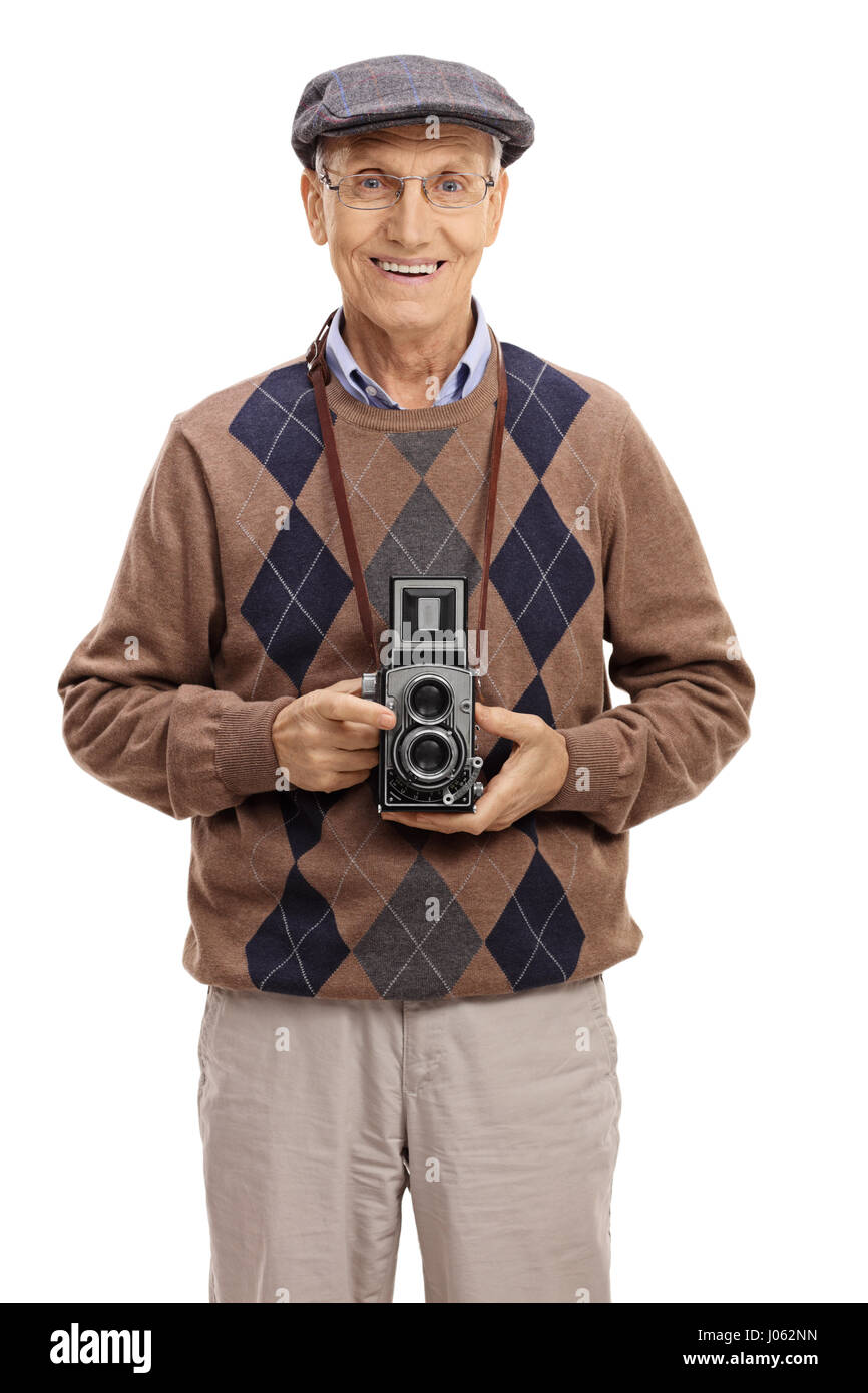 Elderly man holding a vintage camera isolated on white background Stock ...