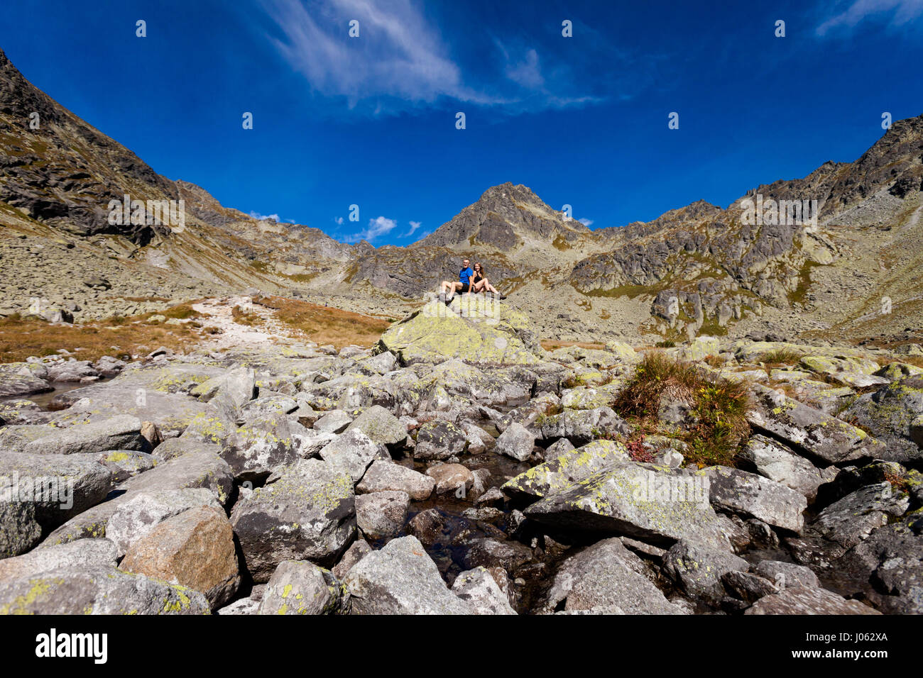 Tourists trekking in Beautiful Mlynicka dolina on the way to Bystre ...