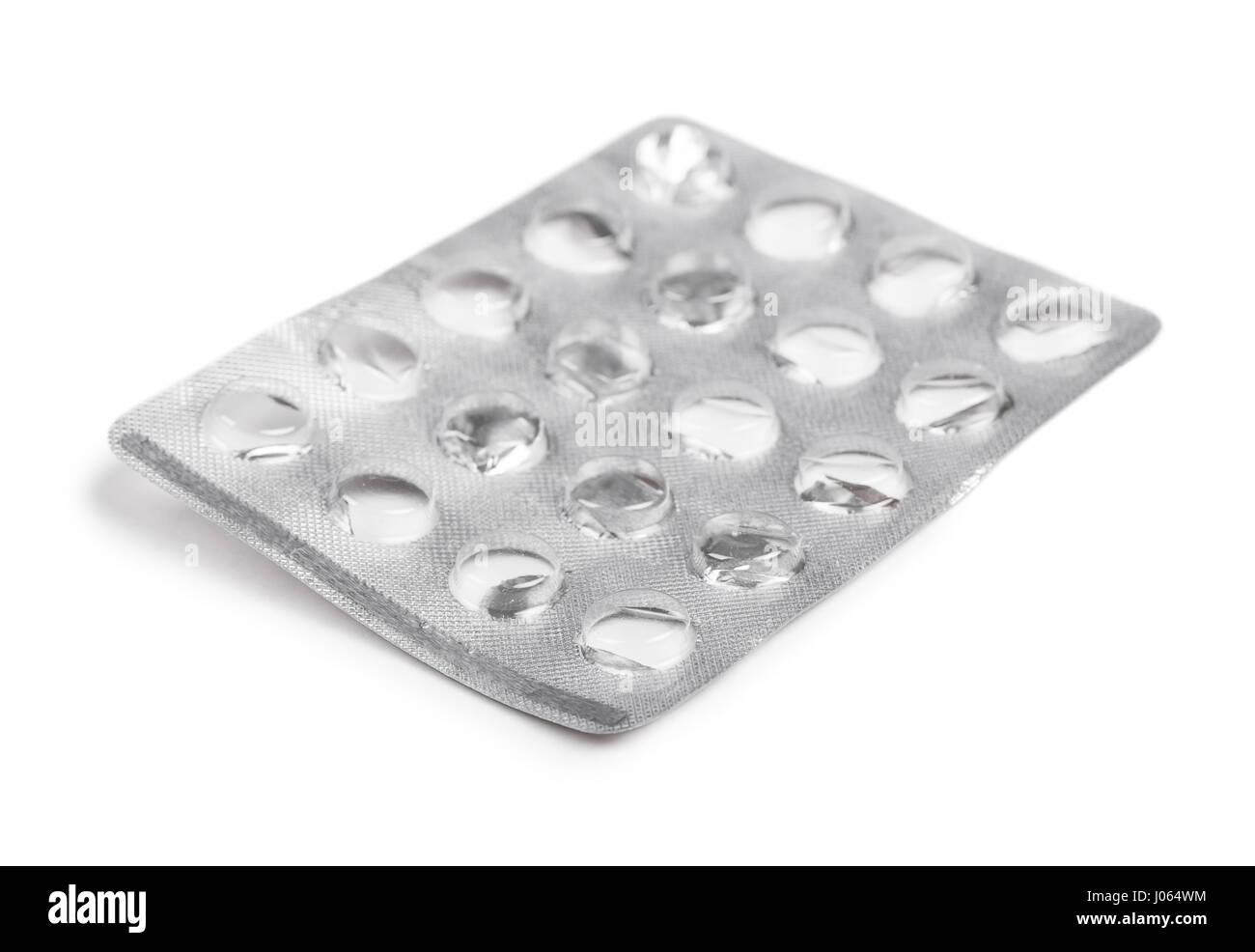 Empty pack of pills isolated on white background Stock Photo - Alamy