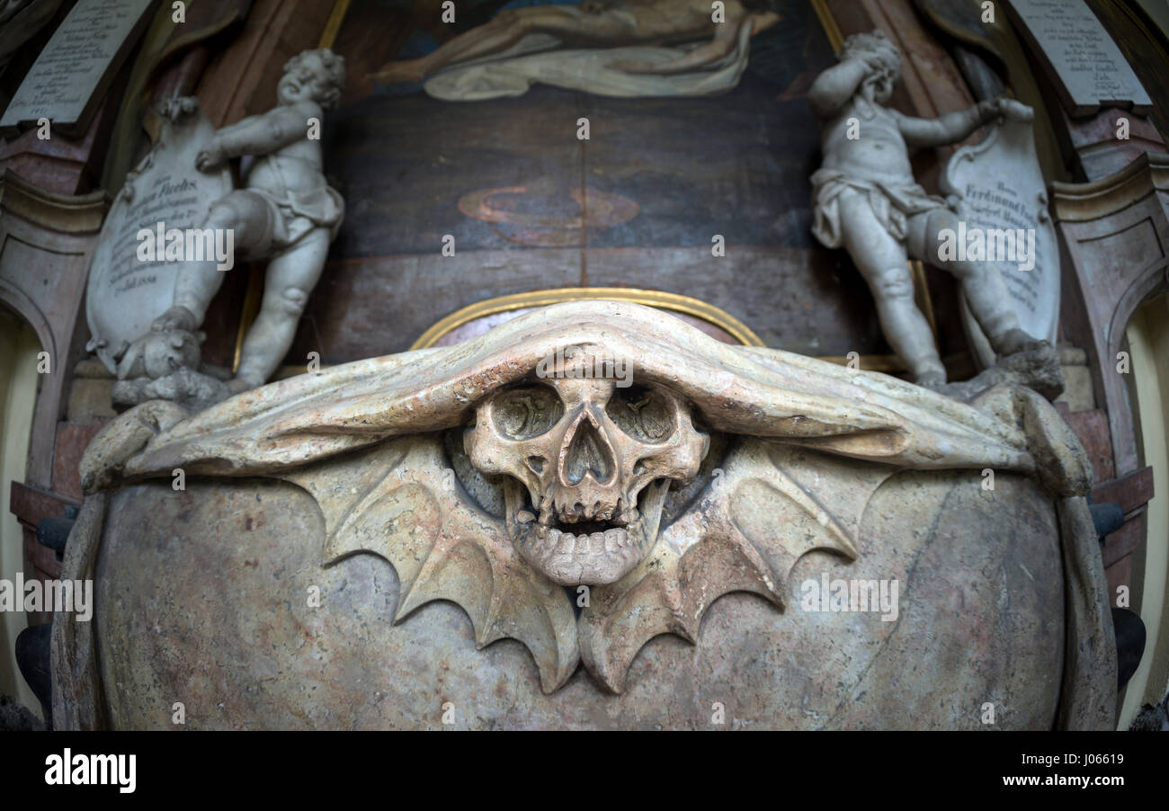 Skull sculpture at the St. Sebastian cemetery in Salzburg, Austria ...