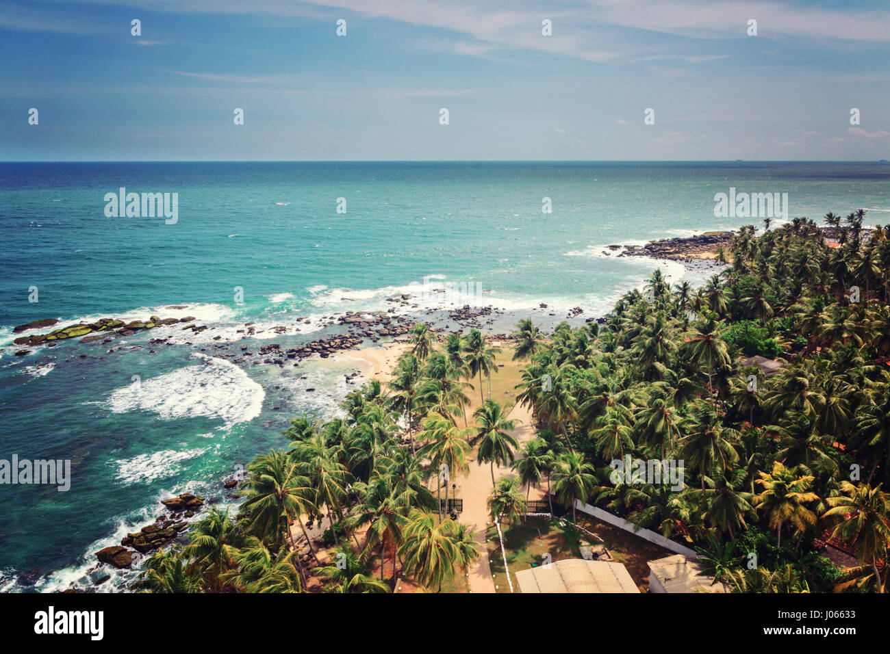 View to ocean and palms from the lighthouse on the most south point of ...