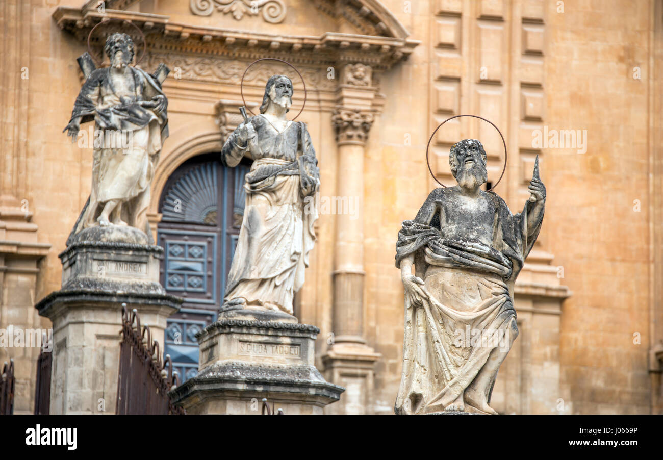 Three Catholic statues outside a chuerch in the beautiful old city of ...