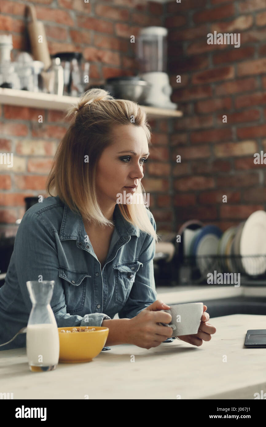 Woman at home Stock Photo - Alamy