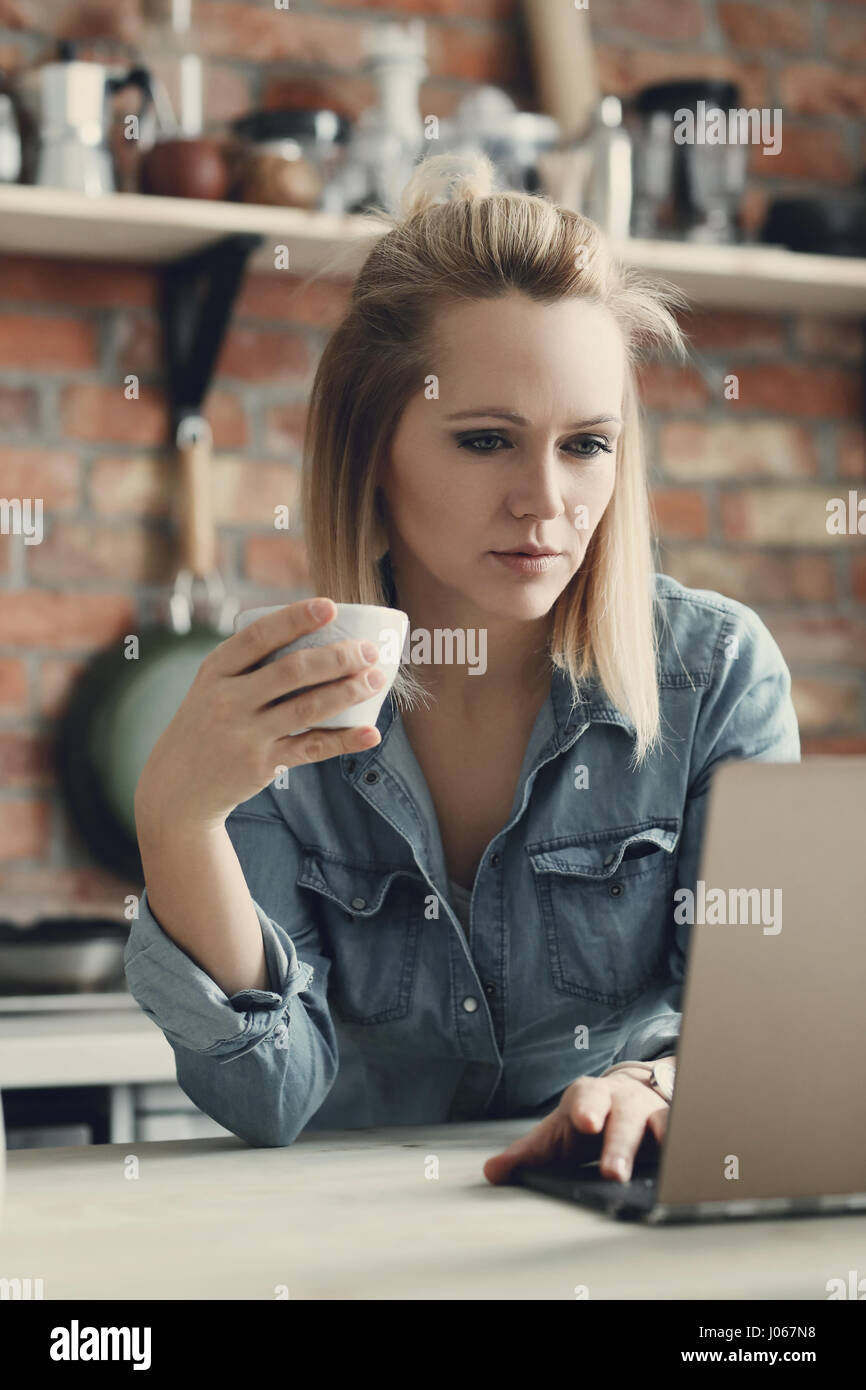 Woman at home Stock Photo - Alamy