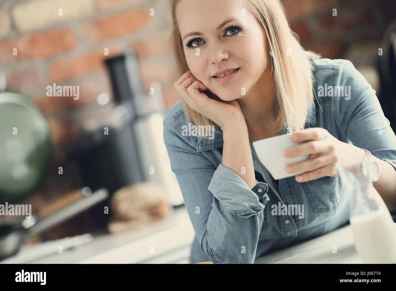 Woman at home Stock Photo - Alamy