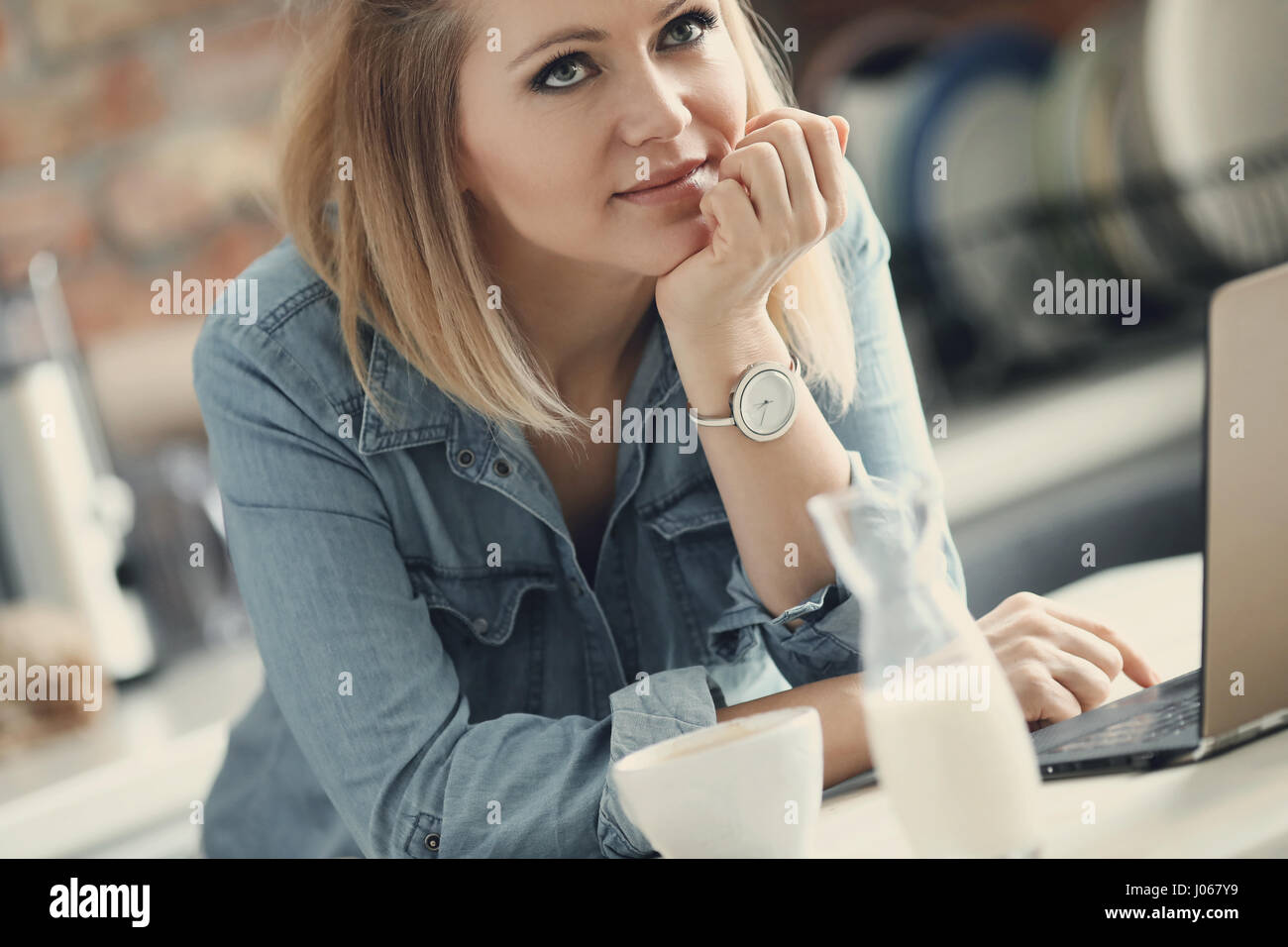 Woman at home Stock Photo - Alamy