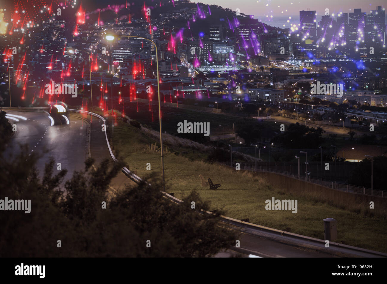 Colourful fireworks exploding on black background against illuminated ...