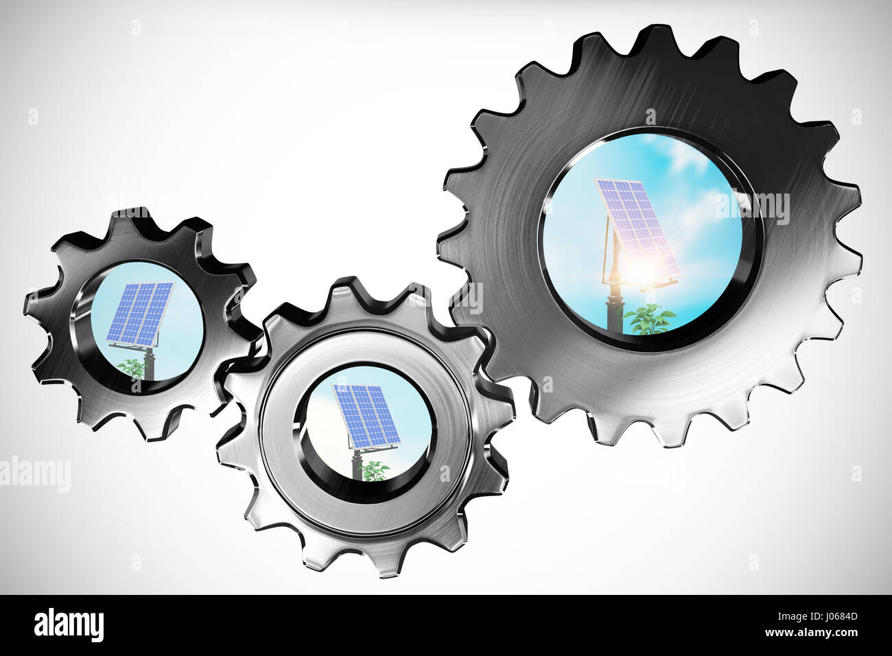 Metal cogs and wheels connecting against blue sky Stock Photo - Alamy