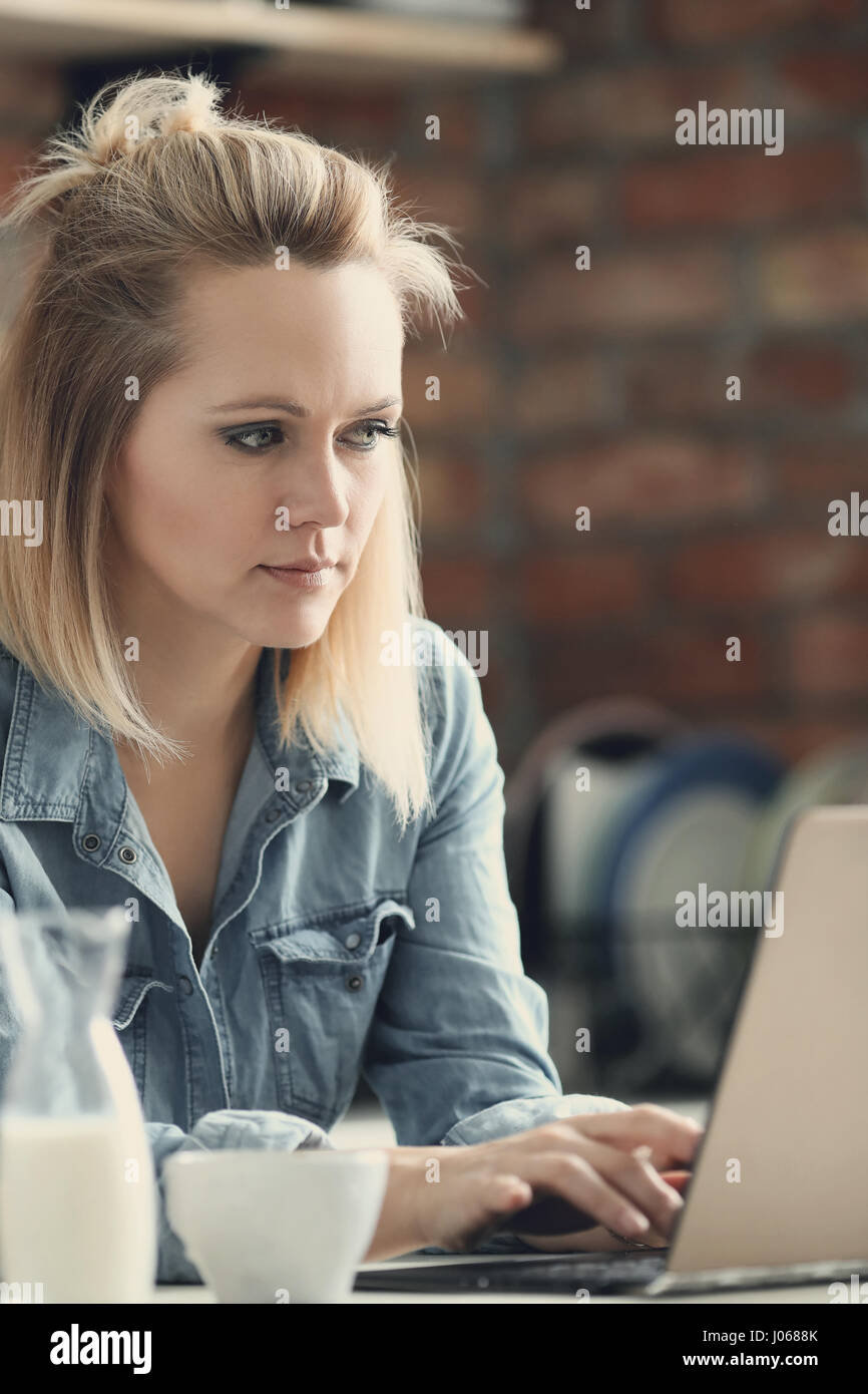 Woman at home Stock Photo - Alamy