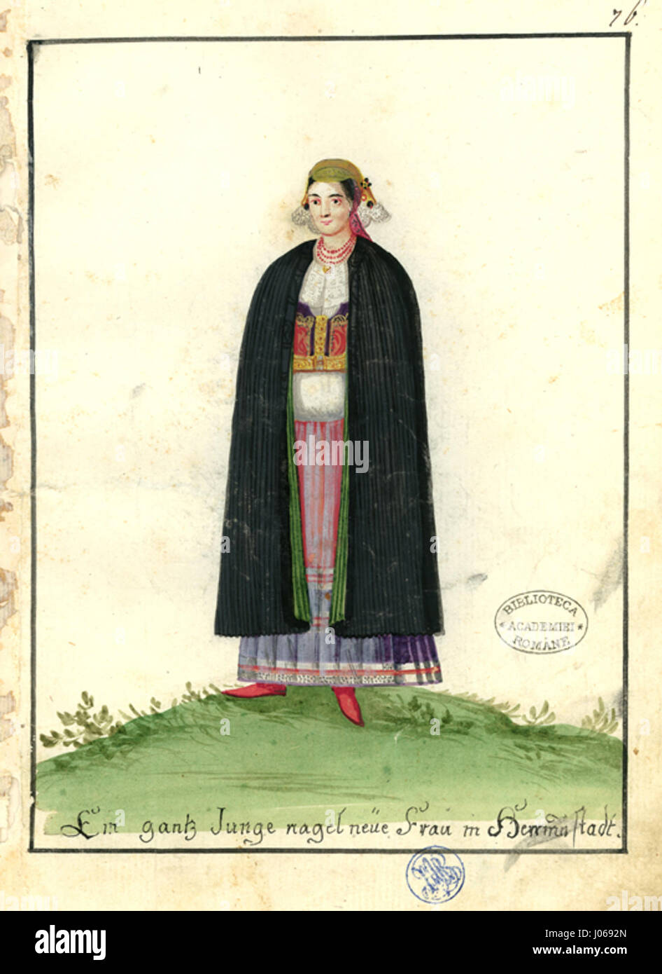 This piece displays a traditional outfit from Transylvania, featuring a ...