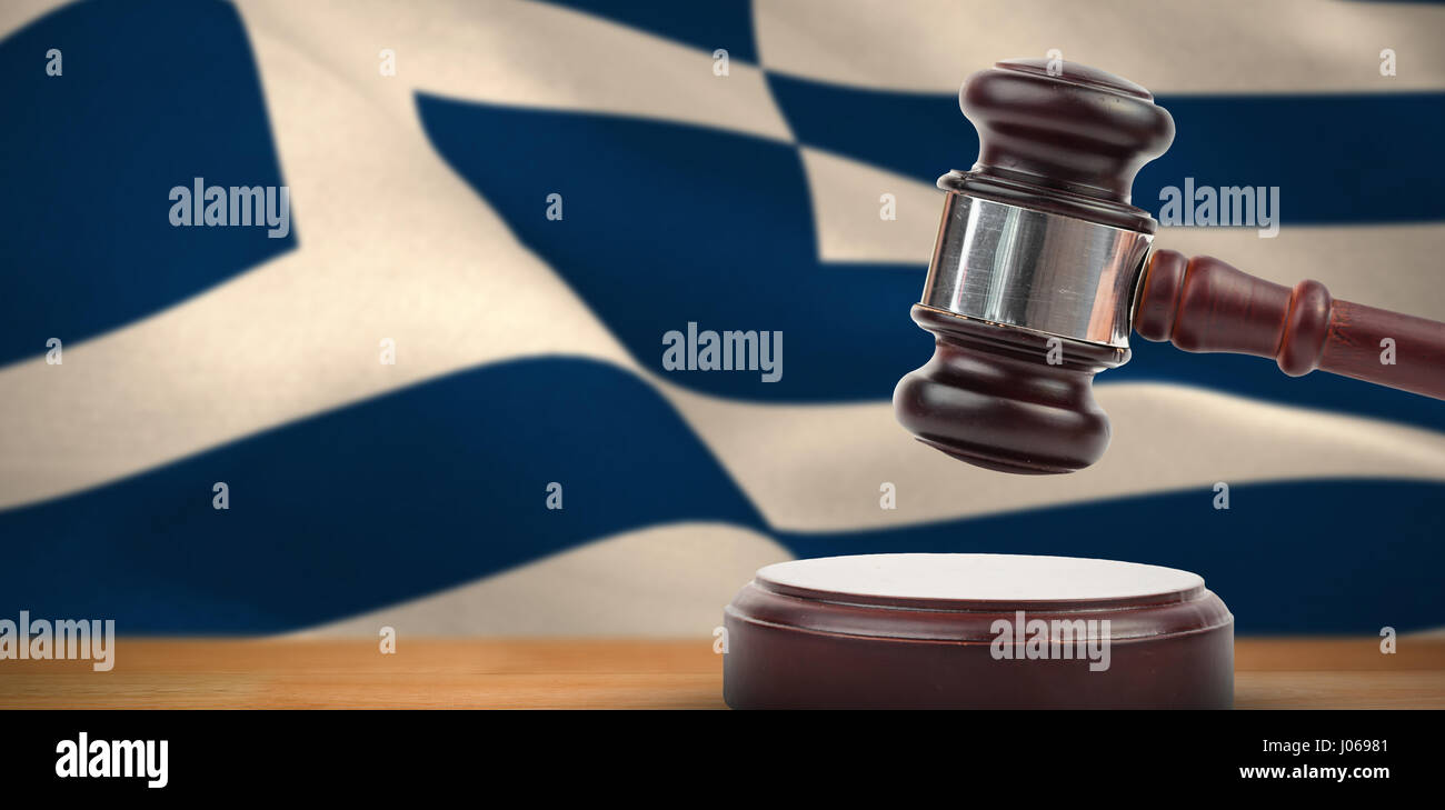 Hammer and gavel against 3d digitally generated greek national flag ...