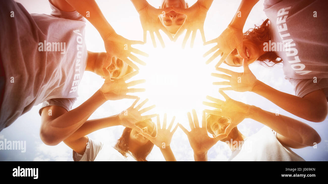 Hands forming a circle low angle Stock Photo - Alamy