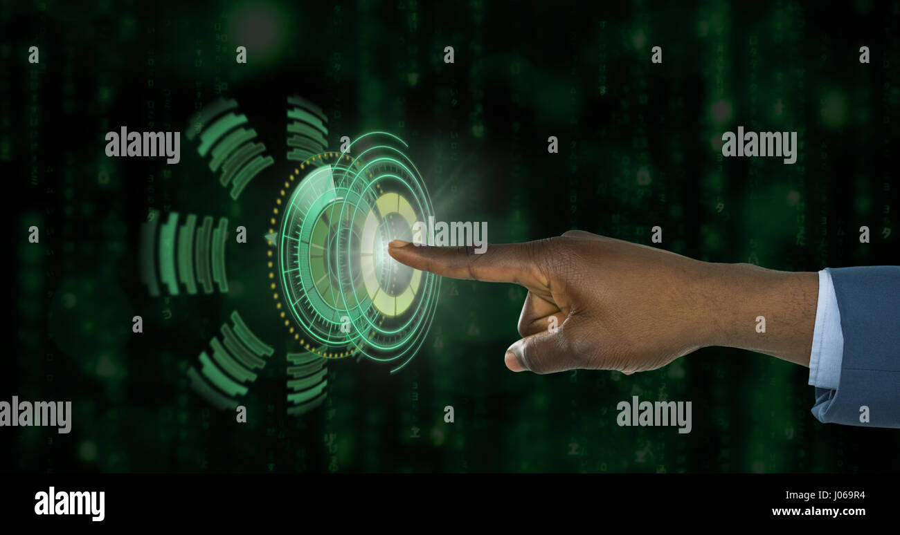 Hand pointing finger against digitally generated black and blue matrix ...