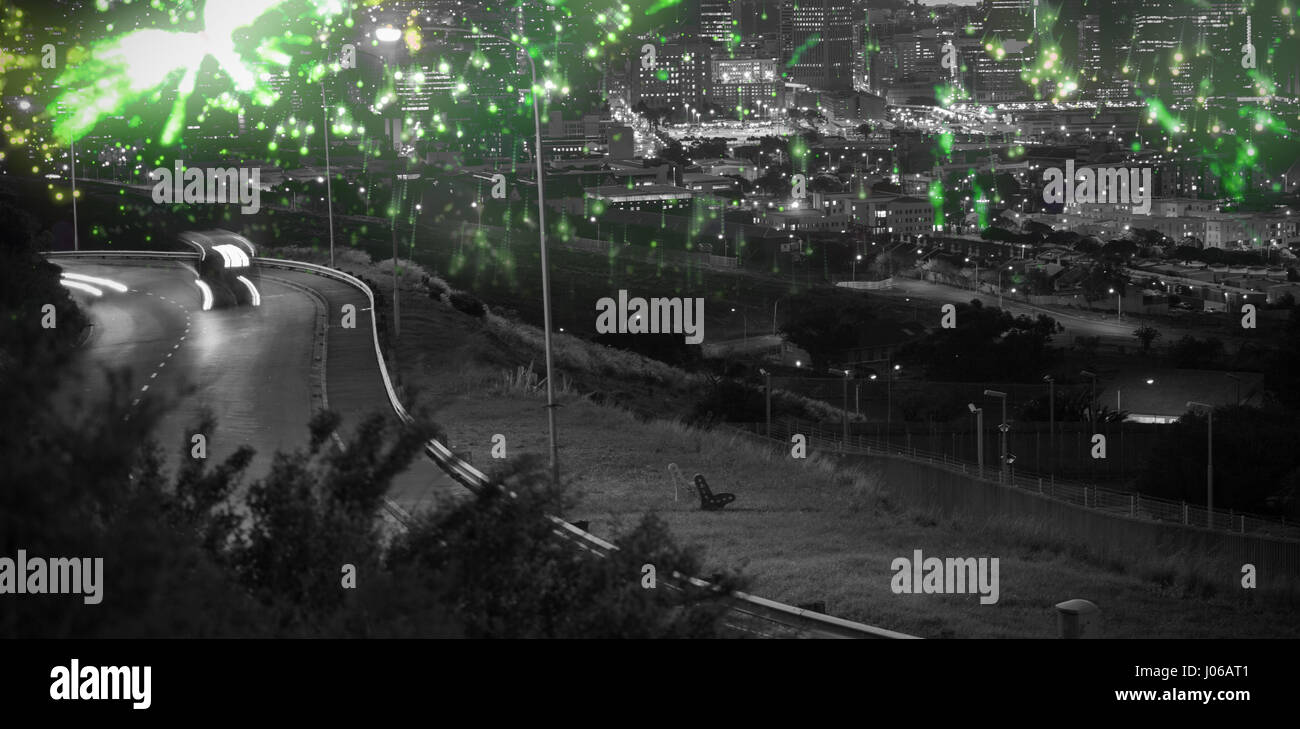 Colourful fireworks exploding on black background against illuminated ...